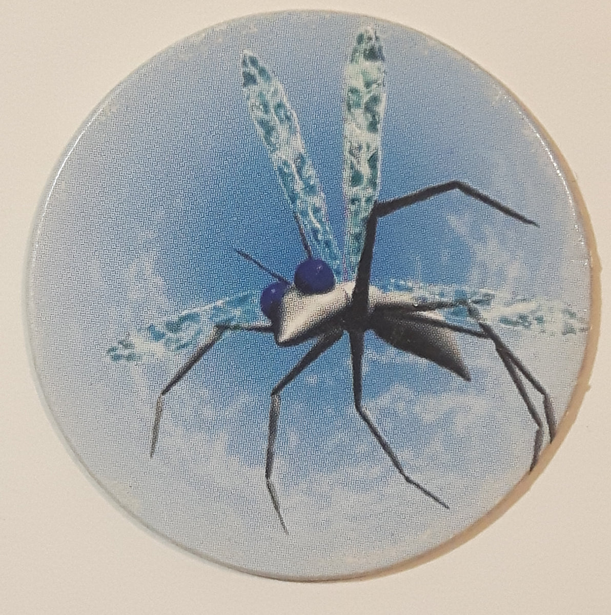 Flying Spider Like Insect Pog Cap – Treasure Valley Antiques & Collectibles