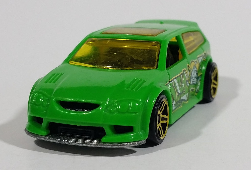 2011 Hot Wheels Graffiti Rides Audacious Neon Green Die Cast Toy Car V ...