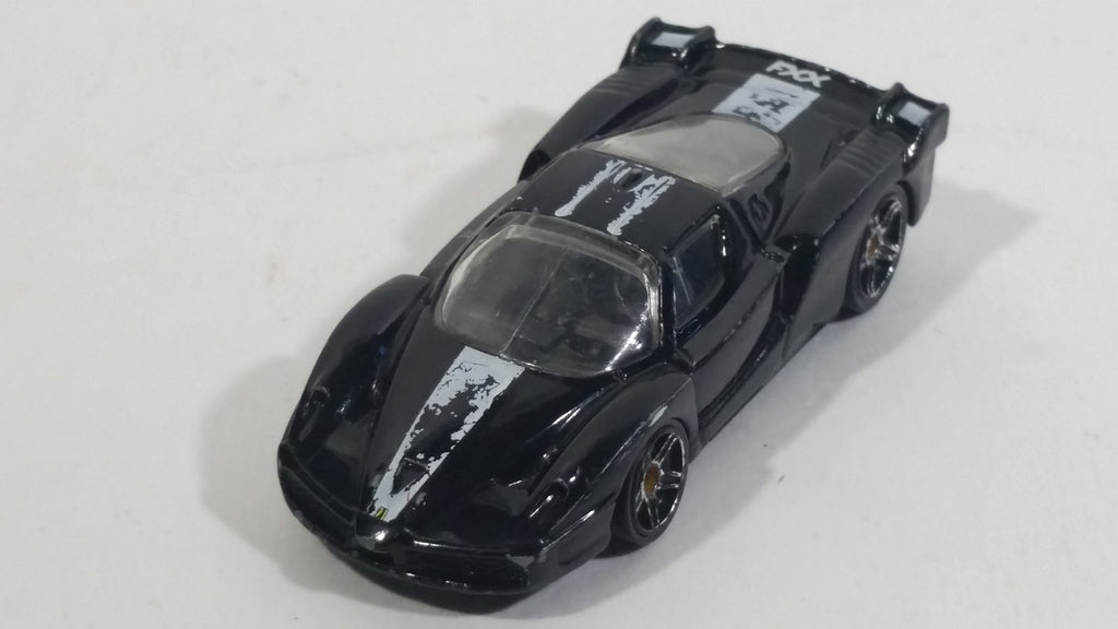 2008 Hot Wheels Ferrari FXX Black with White Stripe Die Cast Toy Dream ...