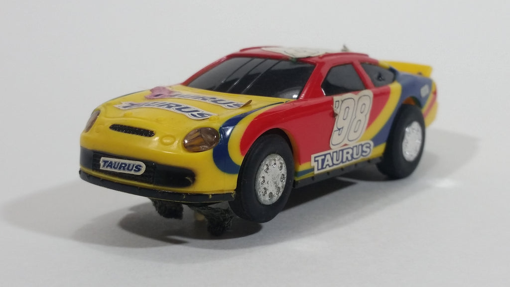 Tyco 1998 Ford Taurus Yellow Blue Red NASCAR Racing Plastic Toy Slot C ...