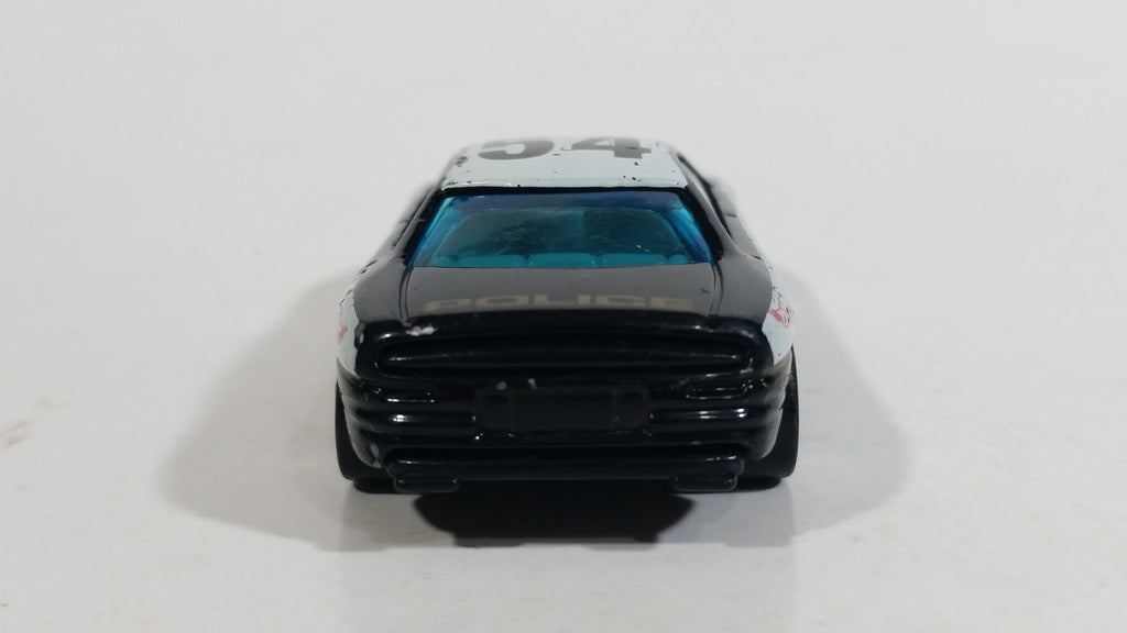 1997 Hot Wheels '93 Warner Oldsmobile Aurora Black and White #54 Polic ...