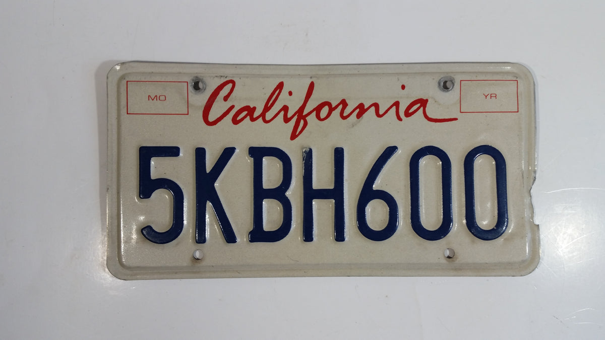 1996-97 California in Red on White with Blue Letters Vehicle License P ...