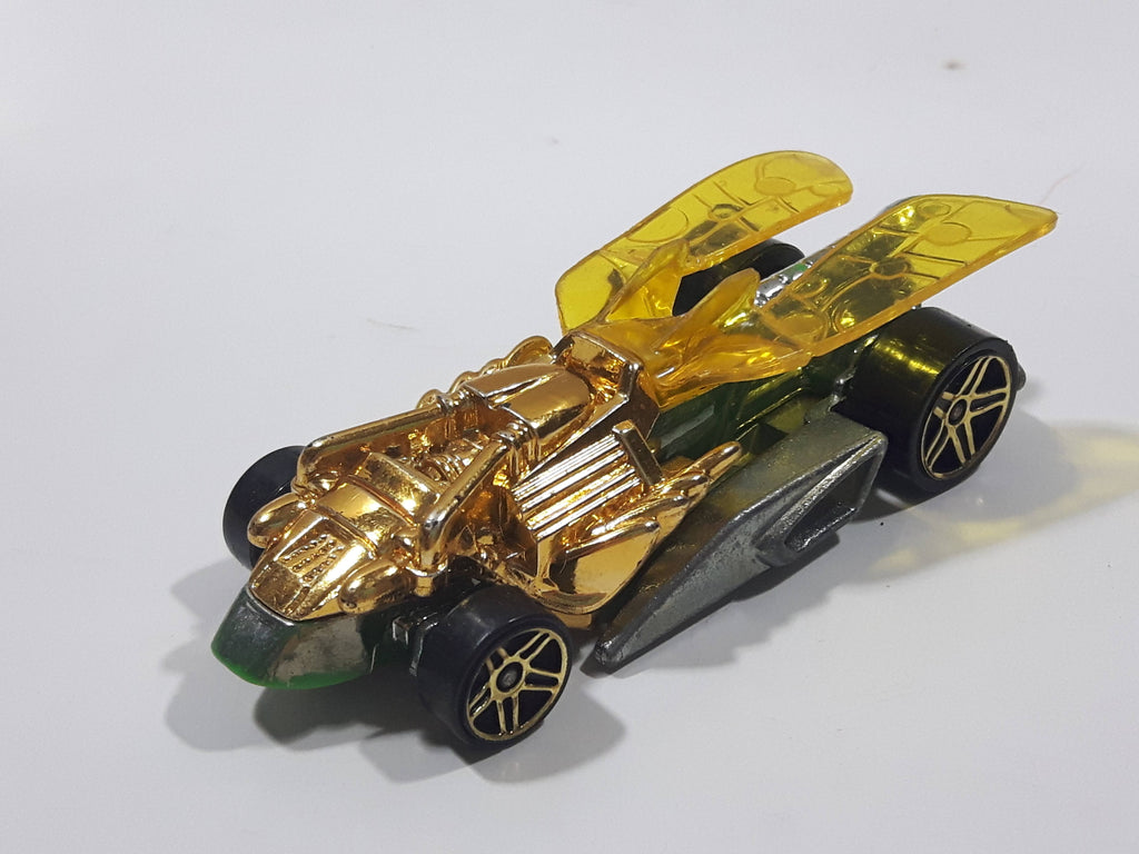 2010 Hot Wheels Insectirides Draggin' Tail Green and Chrome Gold Die C ...