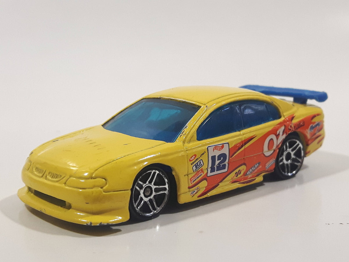 2001 Hot Wheels Holden SS Commodore VT Yellow Die Cast Toy Car Vehicle ...